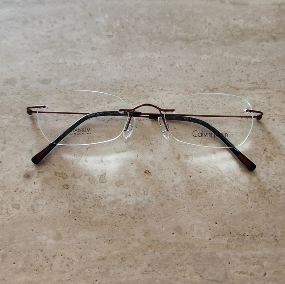 Calvin Klein | Accessories | Nwot Calvin Klein Titanium Rimless ...